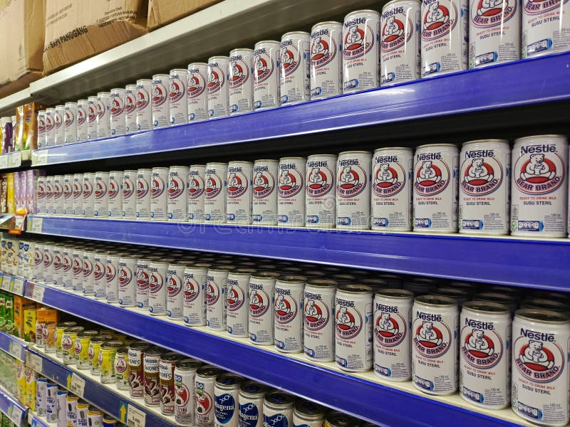Display Rack of Canned Pure Milk in Supermarket Editorial Stock Photo ...
