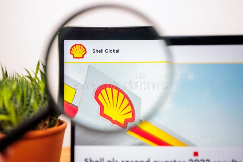 Display of the Shell Website on a Laptop Screen and the Shell Logo ...