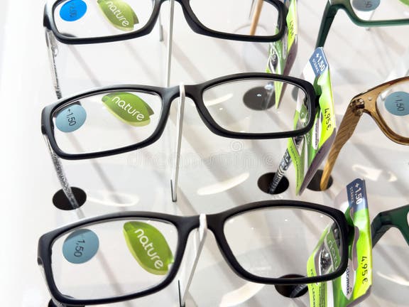 Display of Various Eyeglasses with Black Frames and Nature Tags ...