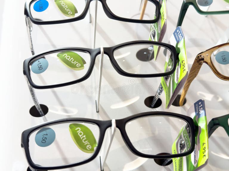 Display of Various Eyeglasses with Black Frames and Nature Tags ...