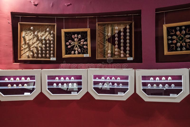 A Display of Various Items, Including a Few Vases and a Few Pictures ...