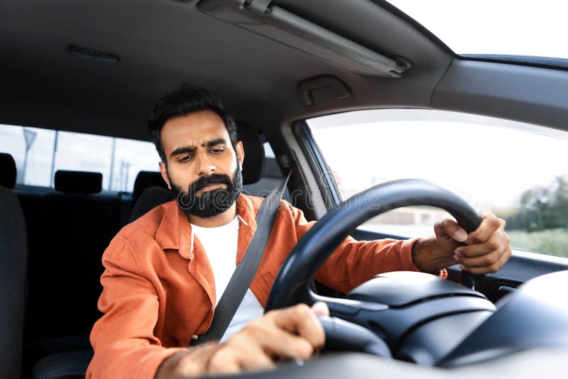 Displeased Middle Eastern Driver Man Driving Having Issue with ...