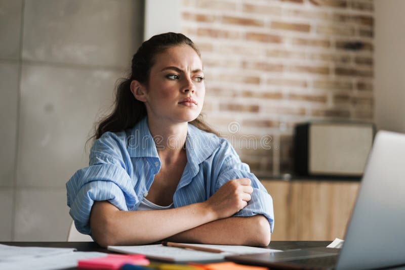 Displeased Negative Girl Indoors at Home Using Laptop Stock Image ...