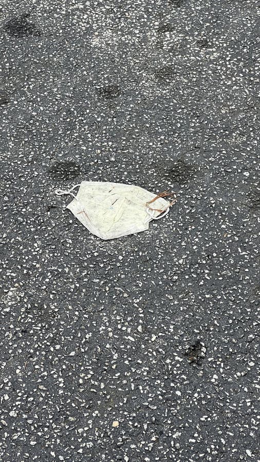 Disposable Covid -19 Mask Thrown on the Ground. Stock Image - Image of ...