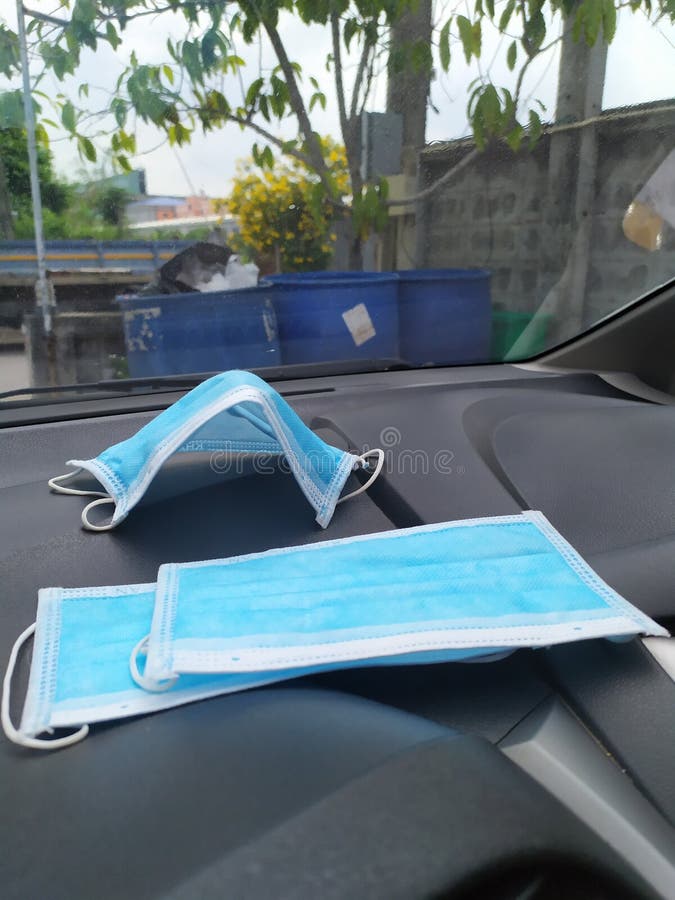 Disposable Face Mask in the Car Stock Image - Image of mask, disposable ...