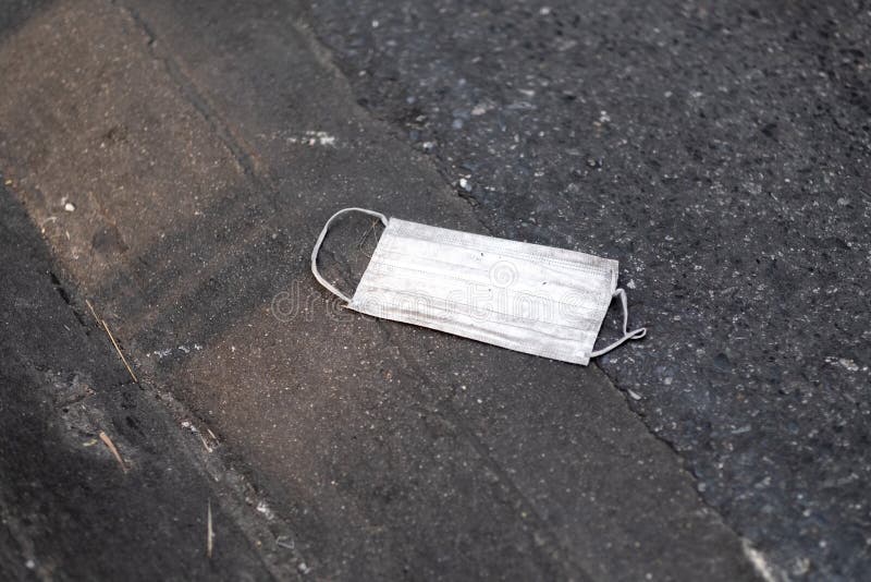 Disposable Face Mask Dropped on the Street Stock Image - Image of ...