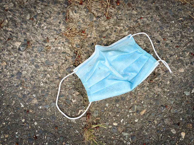 Disposable Face Mask and Pills on Light Background Stock Photo - Image ...