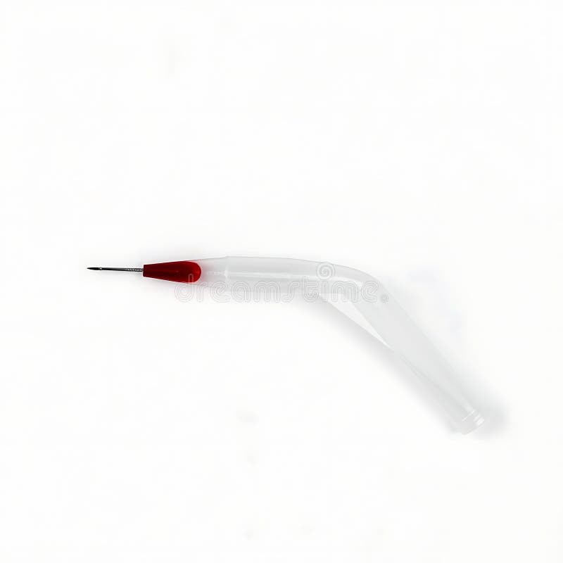 A Disposable Lancet Device for Blood Sampling, Lying Flat on a White ...