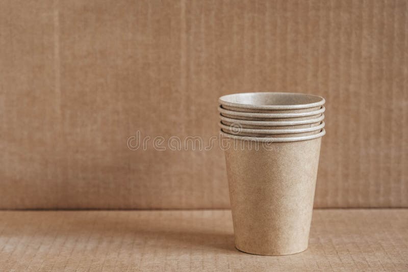 Disposable Paper Cups on Kraft Paper Background. Eco Friendly ...