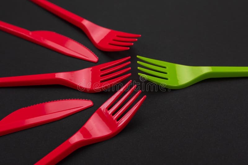 Disposable Red and Green Plastic Forks on Background Stock Photo ...