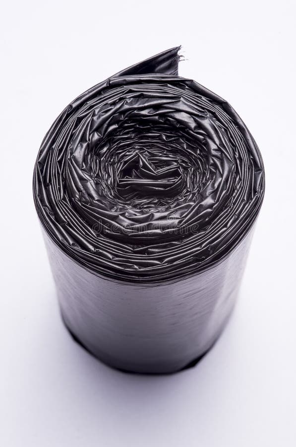 Rolled garbage plastic bag stock photo. Image of dump - 158130546