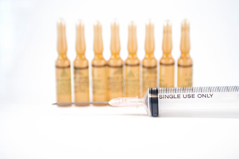 Disposable Syringe and Brown Injection Ampule Stock Image - Image of ...