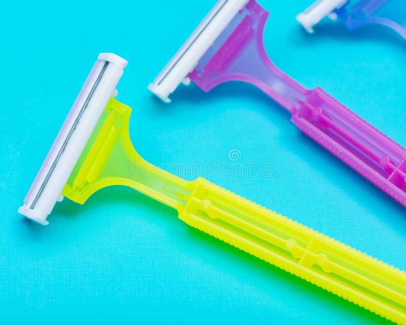 Disposable Women Razors on Blue Stock Photo - Image of background ...