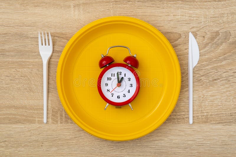 Disposable Yellow Plate with Alarm Clock Stock Image - Image of break ...