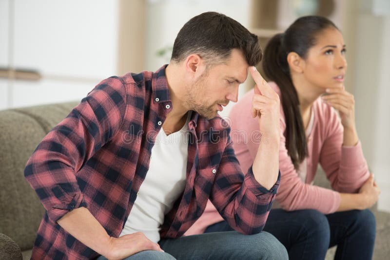 Disputing Couple Sat on Sofa Stock Photo - Image of dumped ...