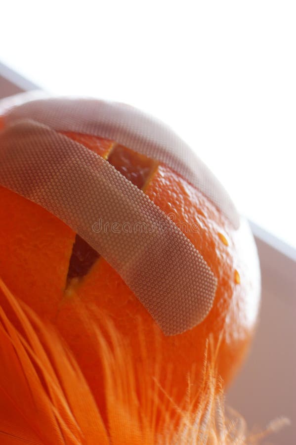 Dissected Damaged Cut Orange Stuck with a Plaster and Dressing Stock ...
