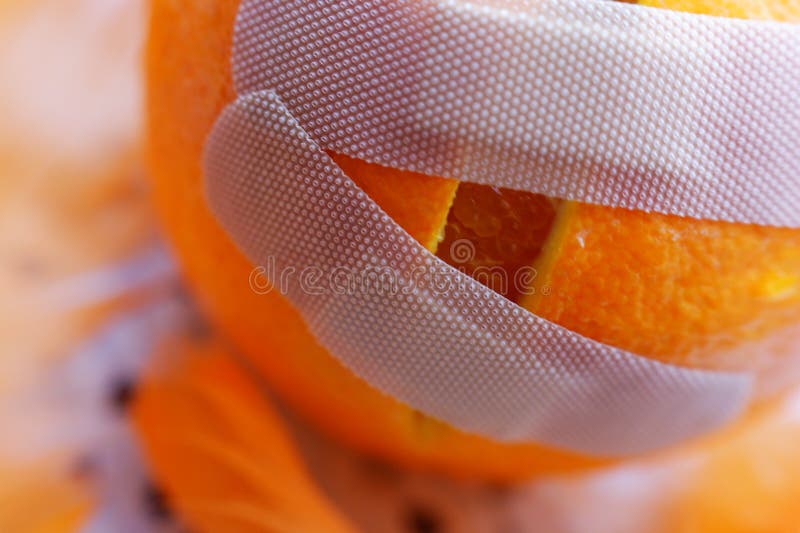 Dissected Damaged Cut Orange Stuck with a Plaster and Dressing Stock ...