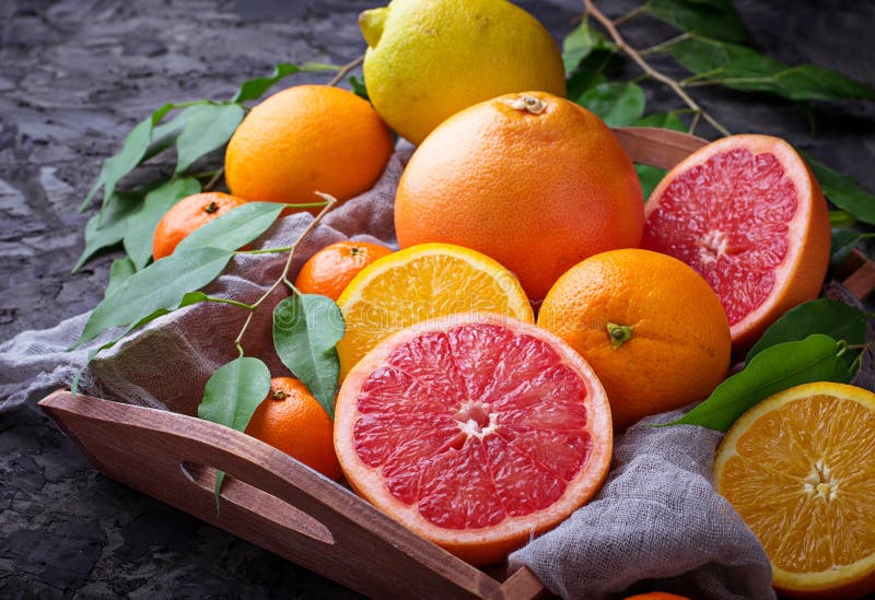 Dissected Fresh Fruits. Orange, Grapefruit and Tangerines Stock Image ...