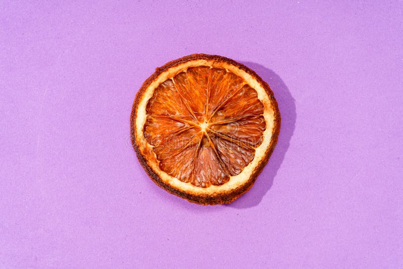 Dissected Orange Slice on a Violet Surface Stock Image - Image of food ...