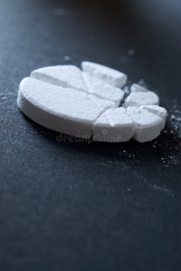 Dissolvable Tablet Broken into Pieces Stock Photo - Image of white ...