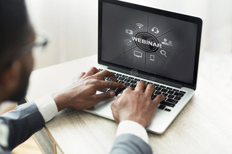 Distance Learning. African American Office Worker Using Laptop with ...