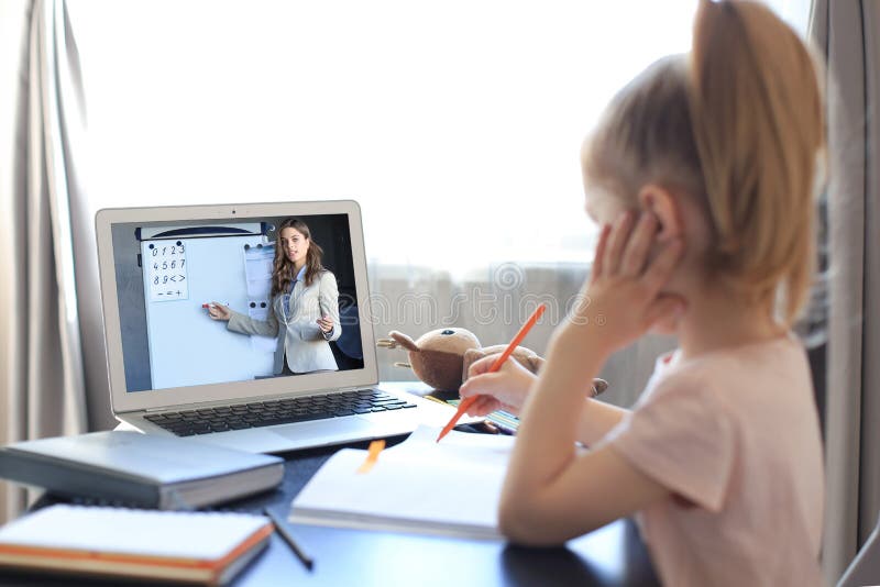 Distance Learning. Cheerful Little Girl Using Laptop Computer Studying ...