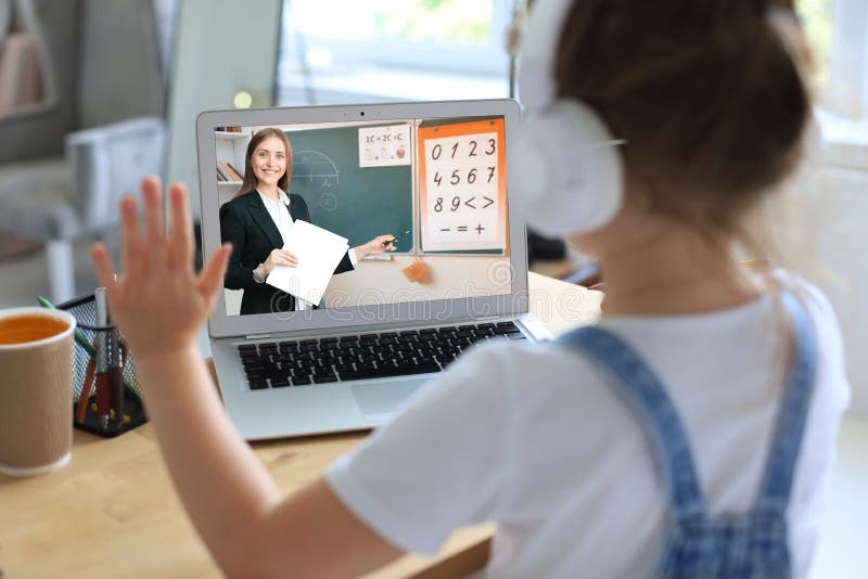 Distance Learning. Cheerful Little Girl Using Laptop Computer Studying ...