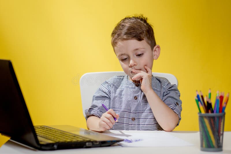 Distance Learning Online Education. a Boy Siting at Home and Does ...