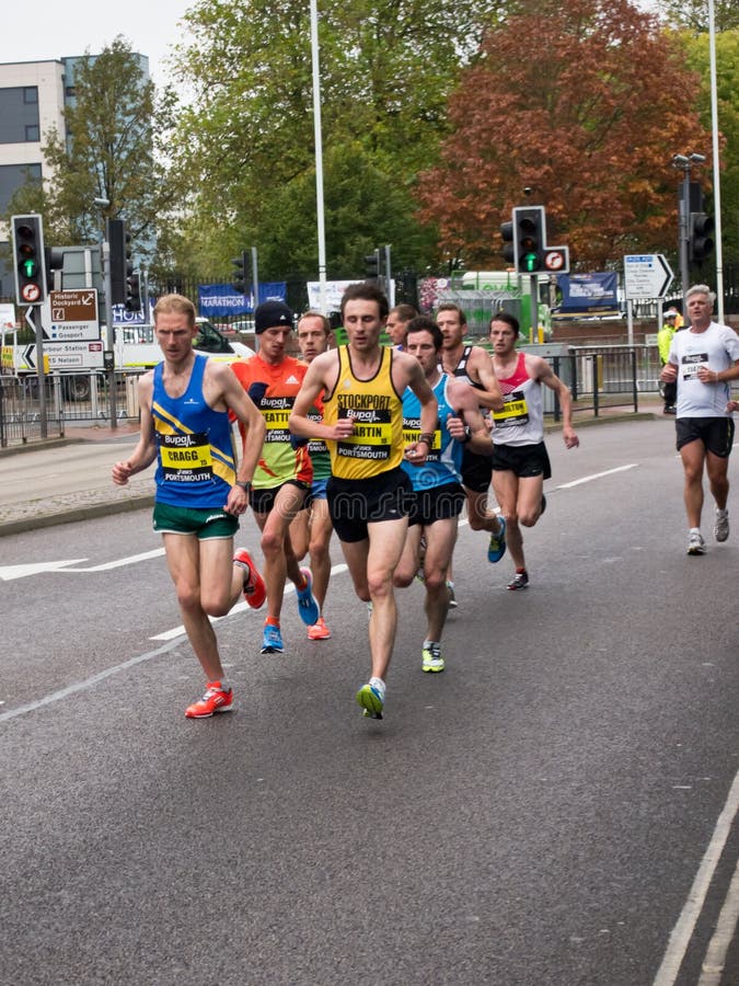 Distance Runners in a Road Race Editorial Photo - Image of rivalry ...