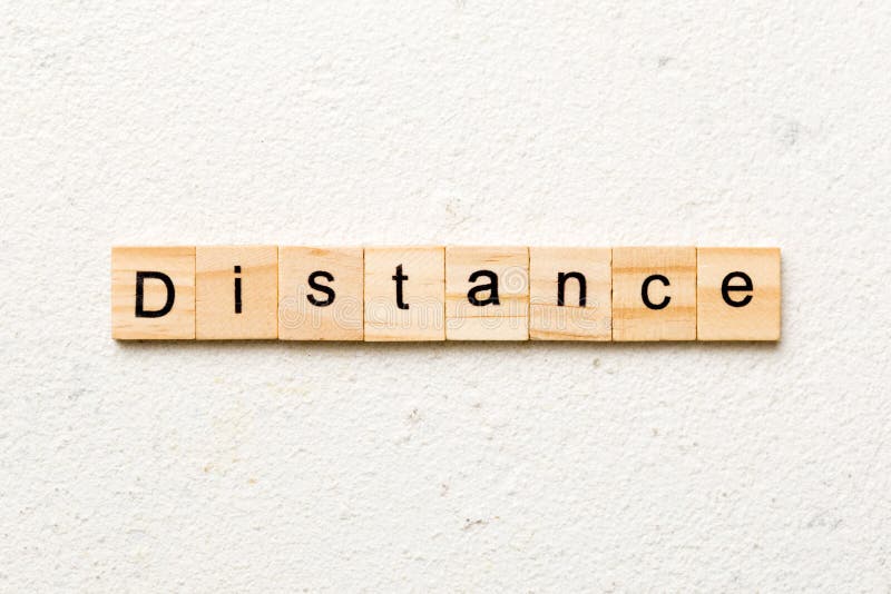 Distance Word Written on Wood Block. Distance Text on Table, Concept ...