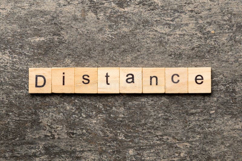 Distance Word Written on Wood Block. Distance Text on Table, Concept ...