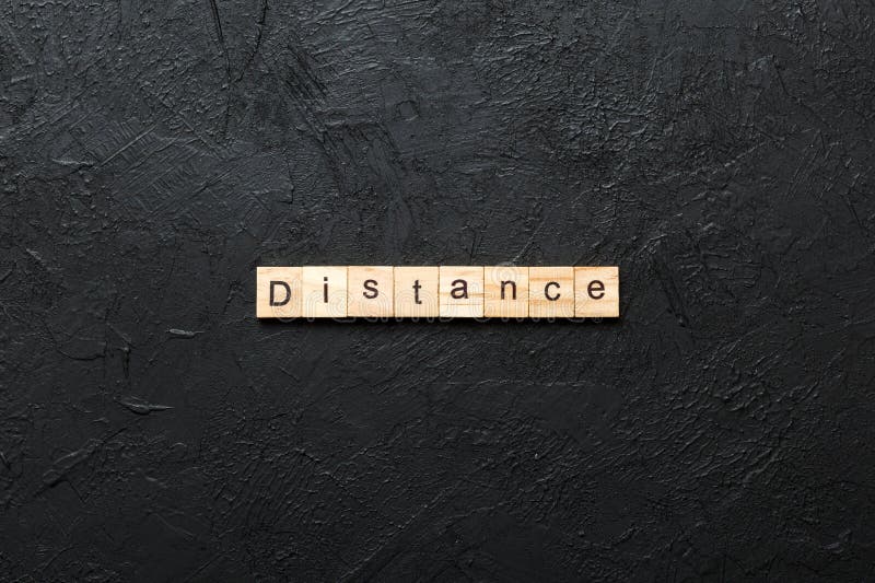 Distance Word Written on Wood Block. Distance Text on Table, Concept ...