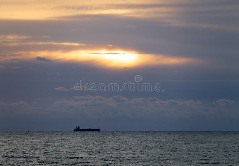 Distant Cargo Ship 2 stock image. Image of boat, move - 116219407