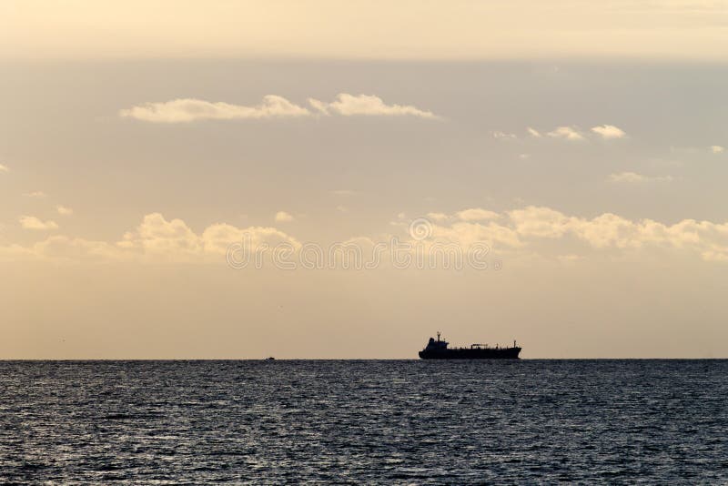 Distant Cargo Ship 2 stock image. Image of boat, move - 116219407