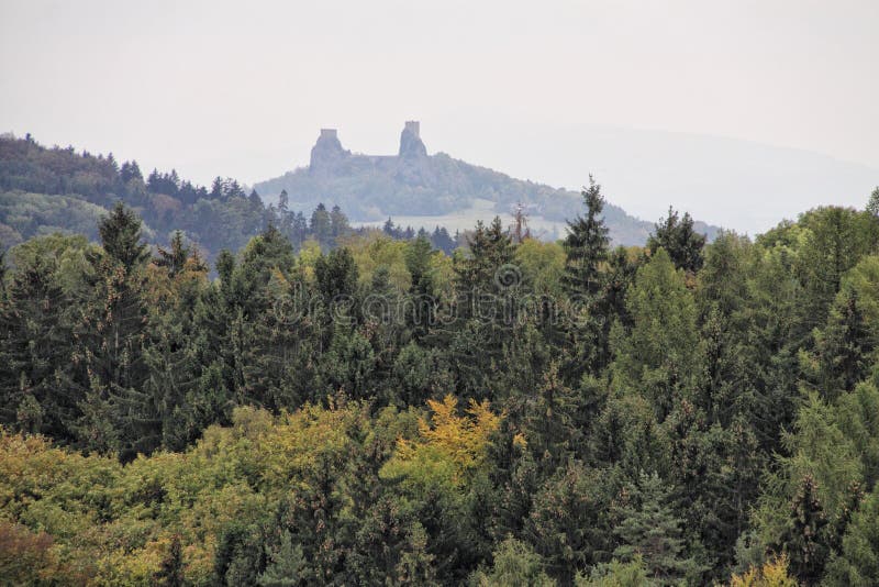 Distant Castle Ruins Above the Forest Stock Image - Image of haze, mist ...