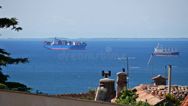Distant Container Cargo Ships in the Sea Harbour Stock Photo - Image of ...