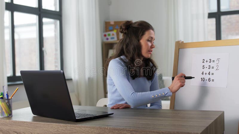 Math Teacher Having Online on Laptop Class at Home Stock Video - Video ...