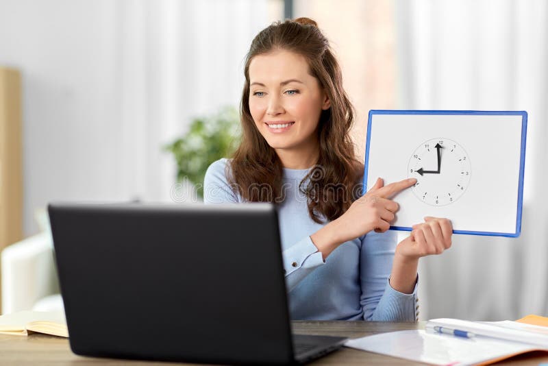 Teacher with Clock Having Online Class at Home Stock Image - Image of ...