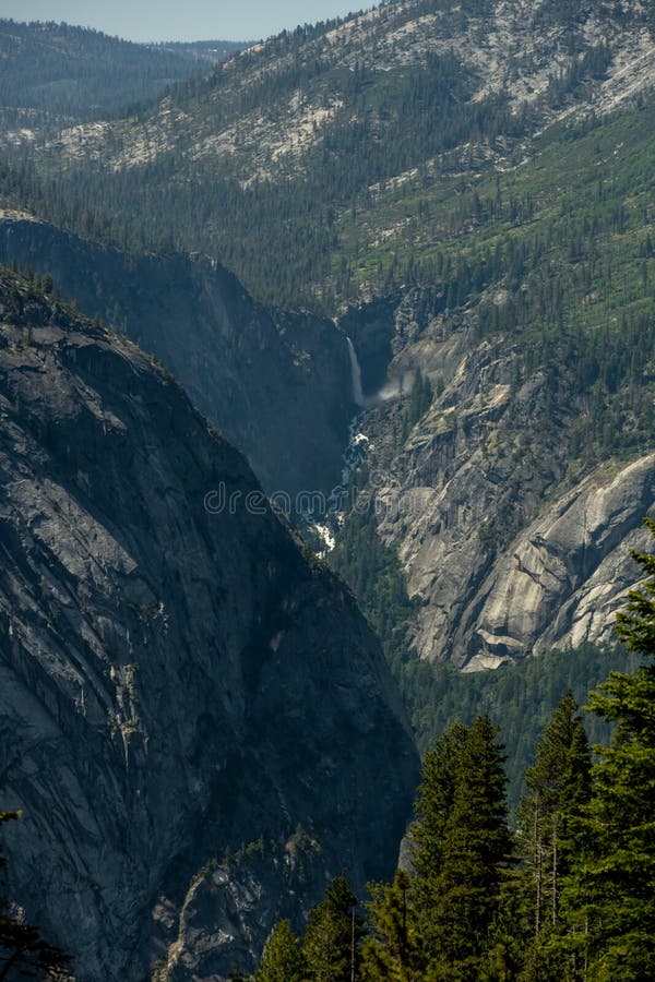 Distant Flow of Illilouette Falls Seen Beyond the Lower Granite of Half Dome Stock Image - Image ...