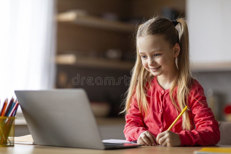 Distant Learning. Little Girl Study with Laptop at Home and Taking ...