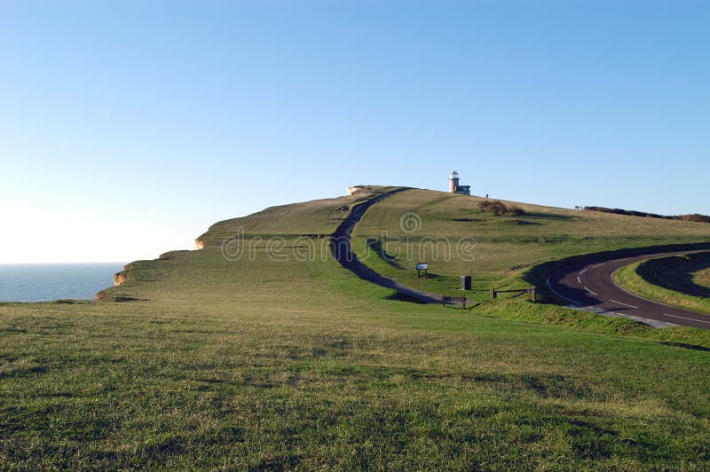 Distant Lighthouse stock image. Image of signal, rocks - 2499521