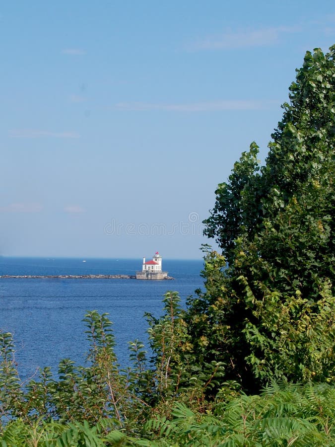 Distant Lighthouse stock image. Image of port, lighthouse - 56891709