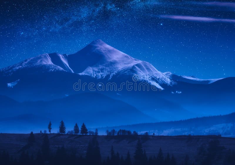 Distant mountain at night stock photo. Image of cluster - 143895844