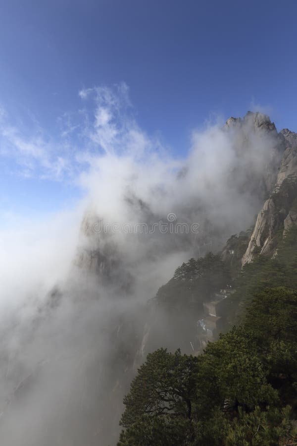 The Distant Mountain Obscured by the Rise of the Cloud Stock Photo ...