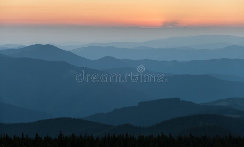 Distant Mountain Range and Thin Layer of Clouds on the Valleys Stock ...