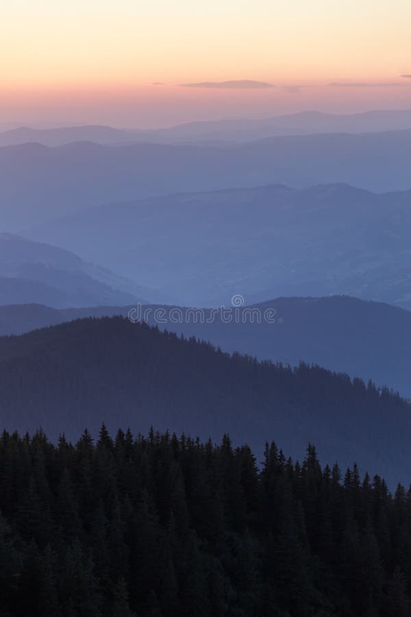 Distant Mountain Range and Thin Layer of Clouds on the Valleys Stock ...