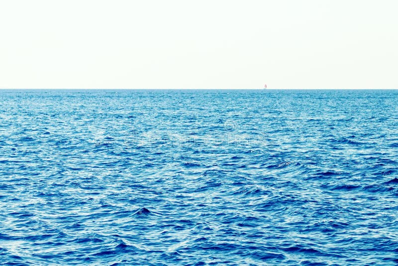 Distant Sail Boat on the Sea, Summer Vacation Stock Image - Image of ...