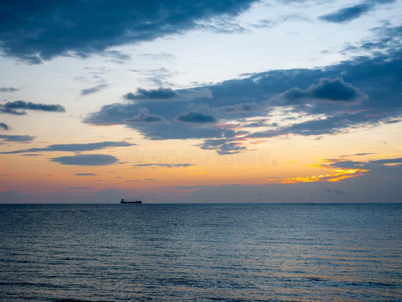 A Distant Ship in the Atlantic Ocean, Florida, during Sunset Stock ...