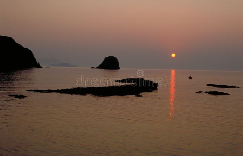 Distant sunset stock photo. Image of greece, rocky, sundown - 148420