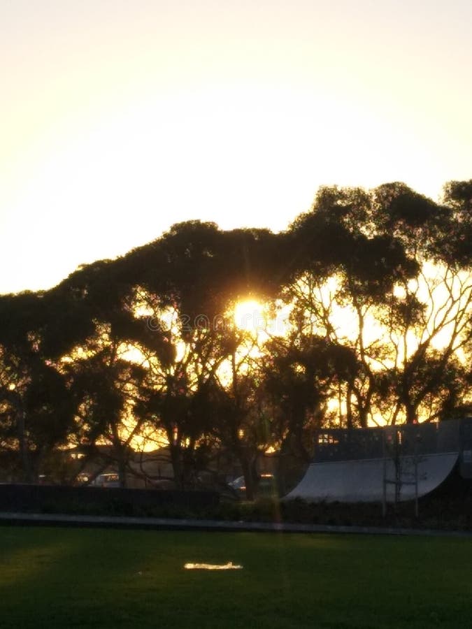 A distant sunset stock photo. Image of dawn, plain, sunrise - 260507236